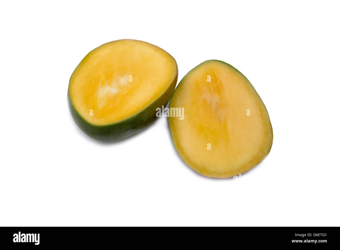 Mango halves on white background Stock Photo - Alamy
