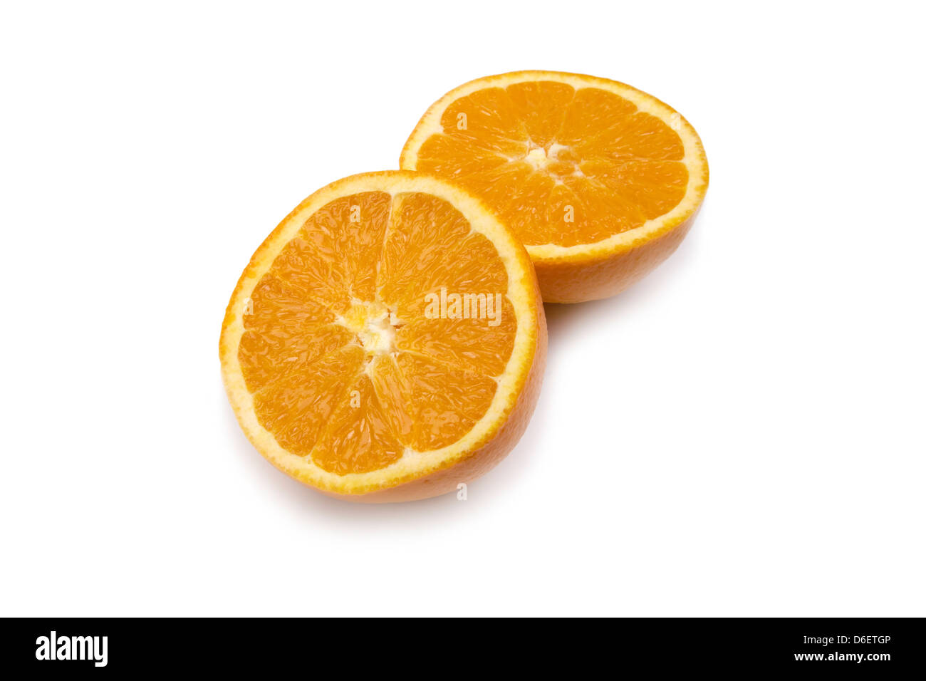 Orange halves on white background Stock Photo - Alamy