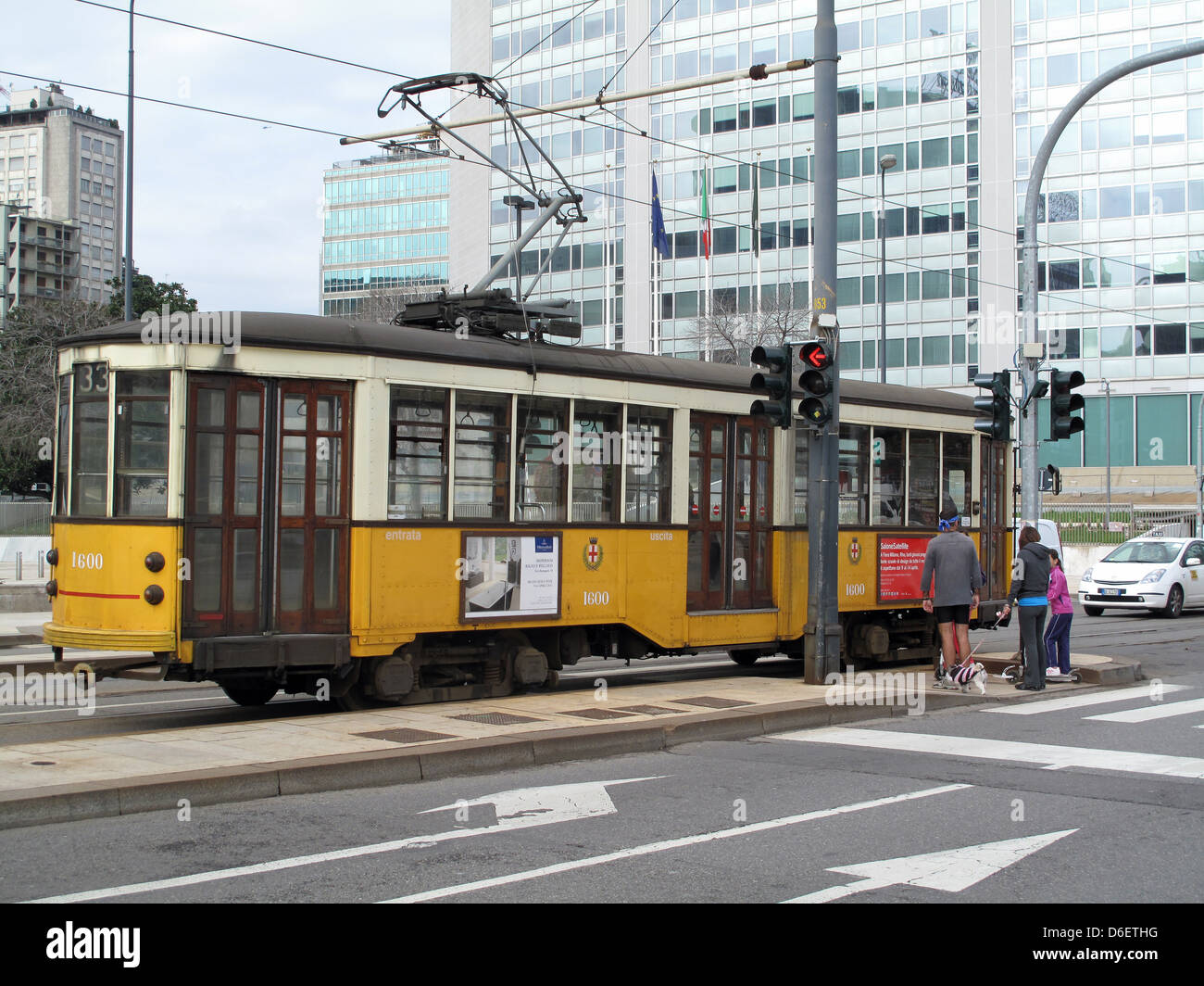 Traditional tram in the centre of Milan Italy Stock Photo - Alamy