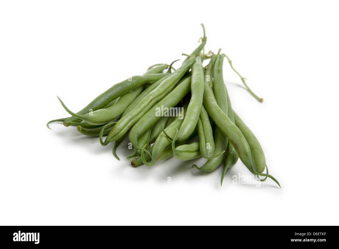 Round green beans on white background Stock Photo - Alamy