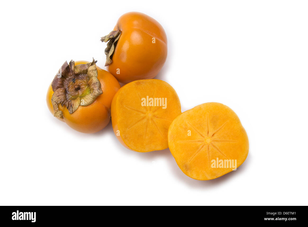Sharon fruit on white background Stock Photo - Alamy