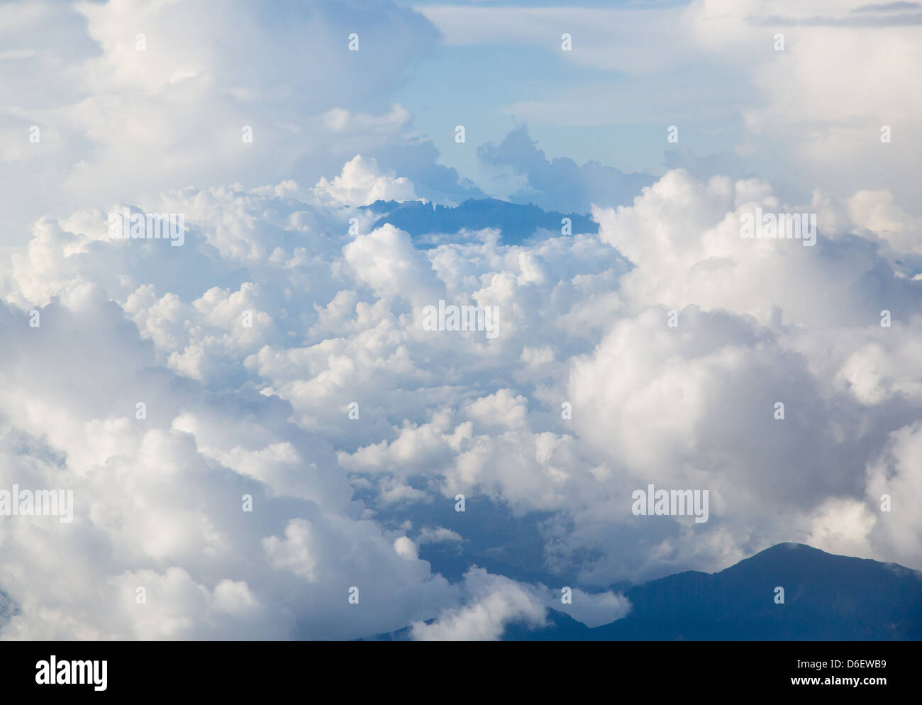 The jagged peaks of the summit of distant Gunung Kinabalu pushing ...