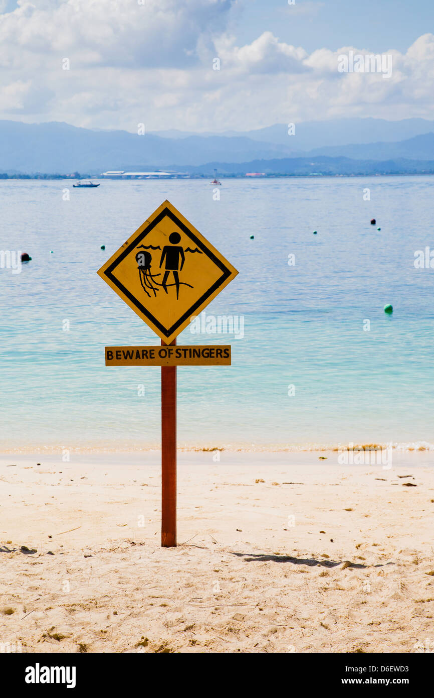 Beware of Stingers sign on the beach at Mamutik off Kota Kinbalu Sabah ...