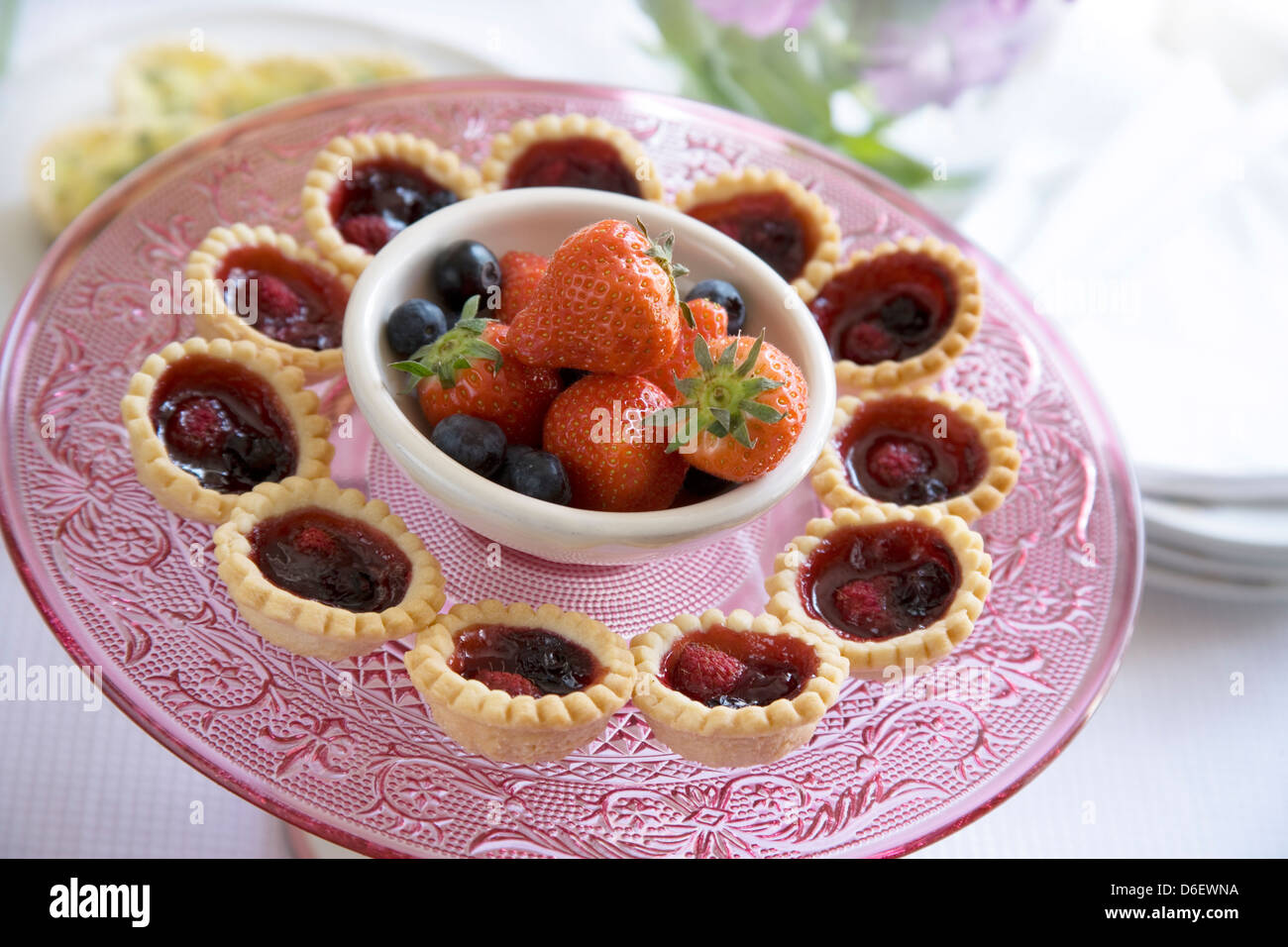 Mini sweet pastry summer berry jam tarts, with extra fresh berries ...