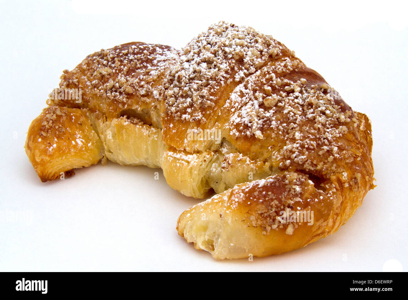 Croissant with nuts and sugar Stock Photo - Alamy