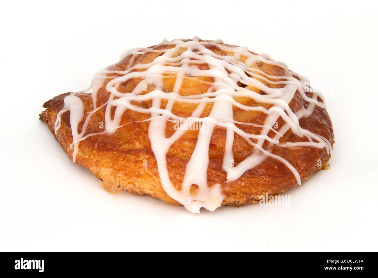 Danish pastry with white icing Stock Photo - Alamy
