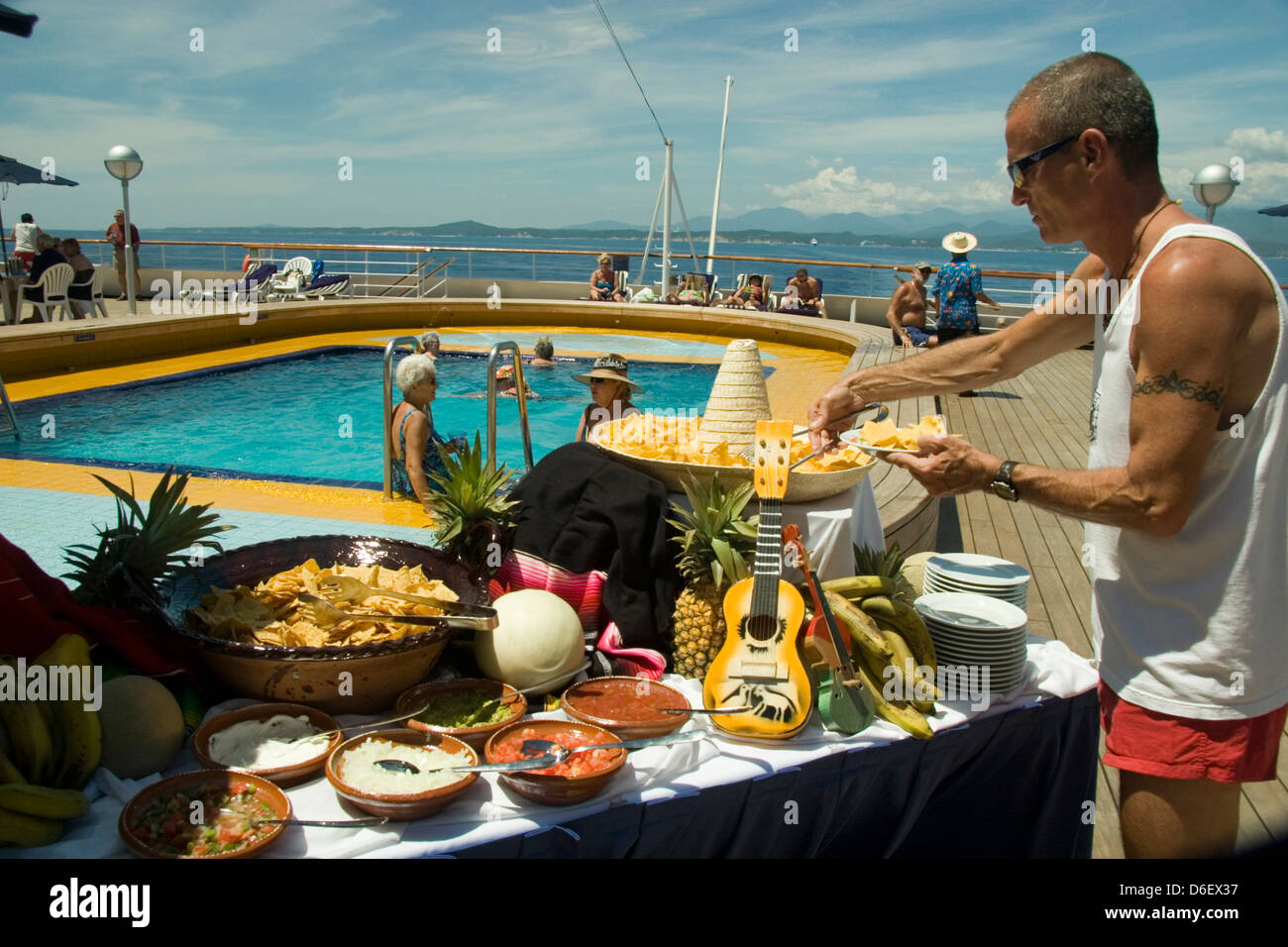 Man serving himself at the mexican buffet on a cruise ship Stock Photo ...