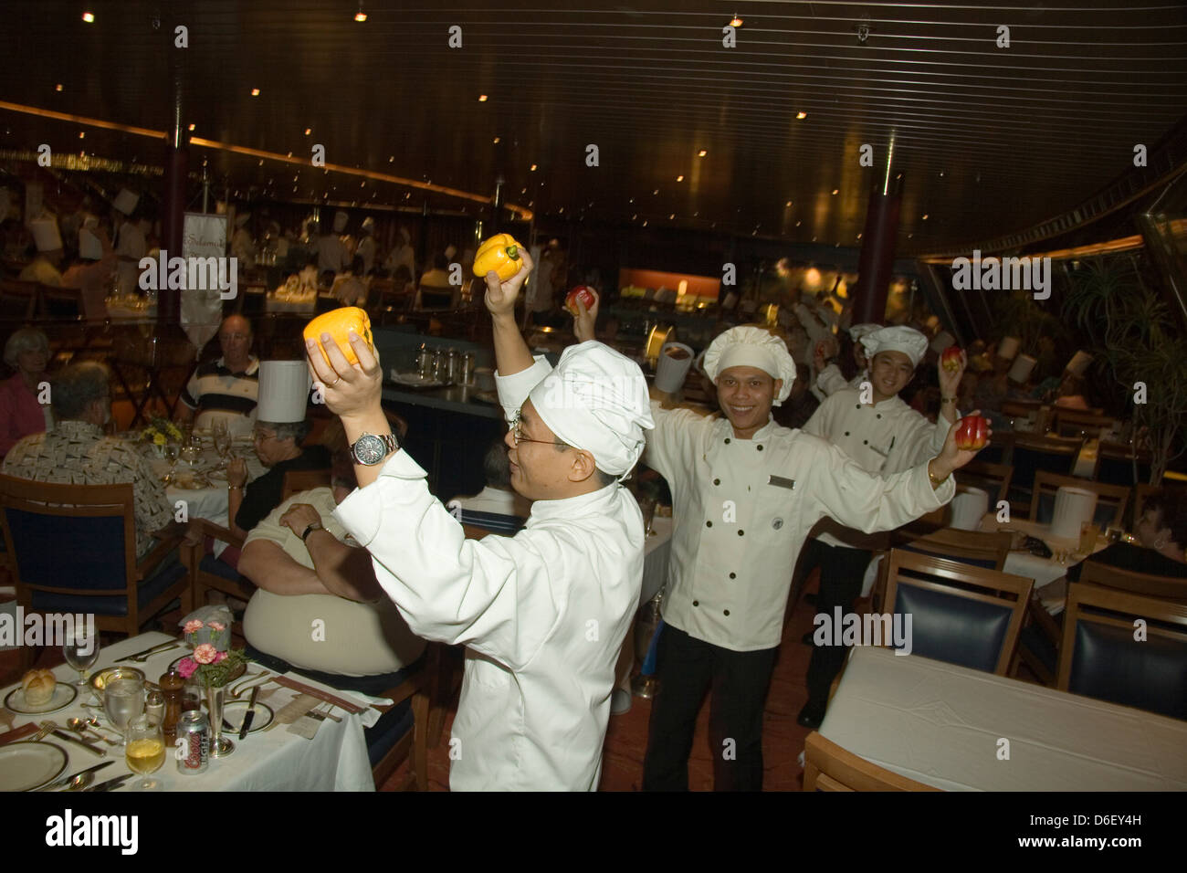 Waiters serving night dessert on a cruise ship Stock Photo - Alamy