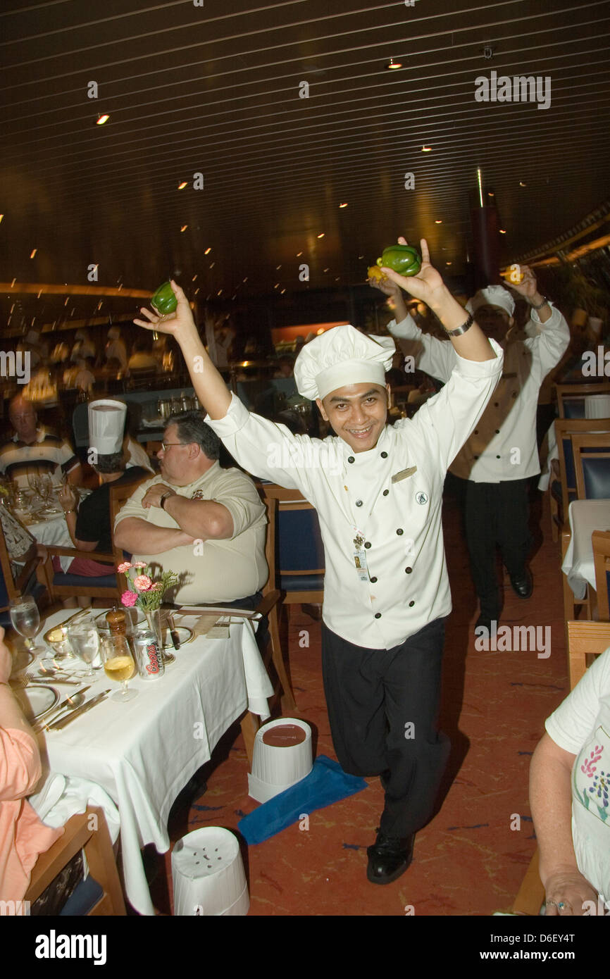 Waiters serving night dessert on a cruise ship Stock Photo - Alamy