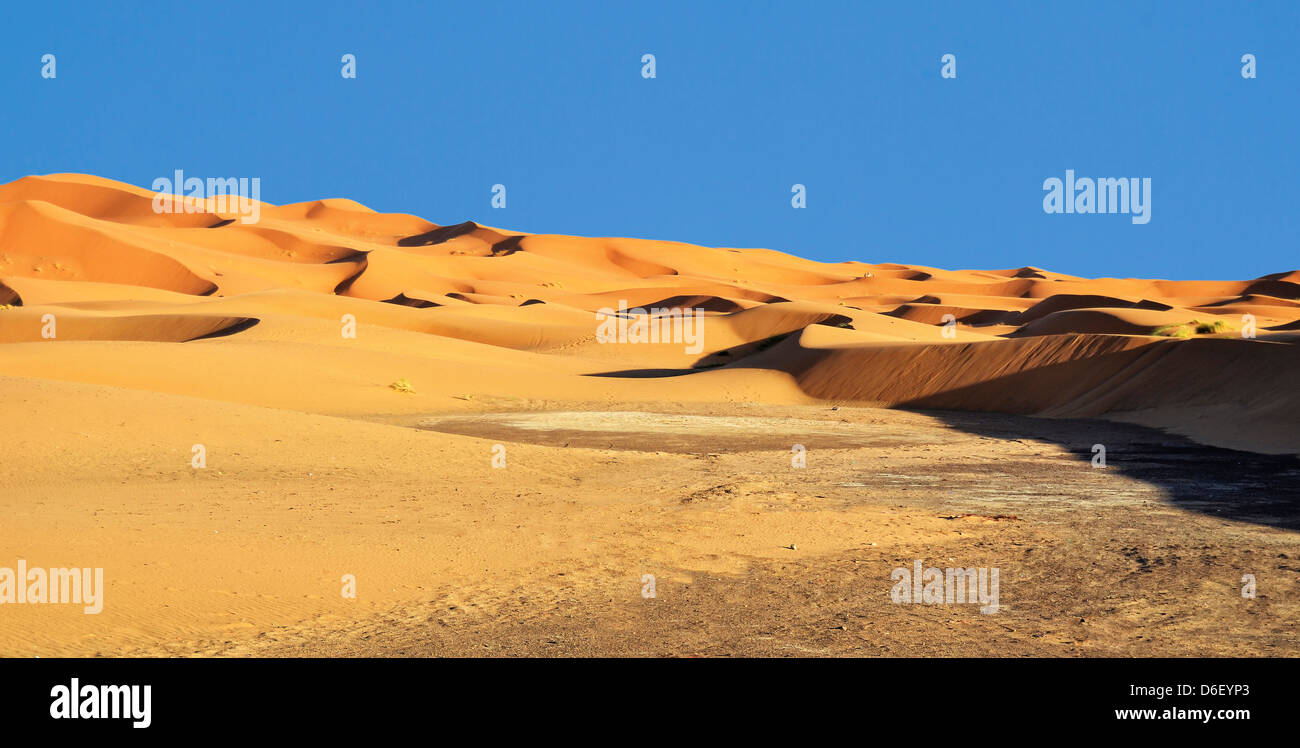 Beautiful sand dunes and blue sky Stock Photo - Alamy
