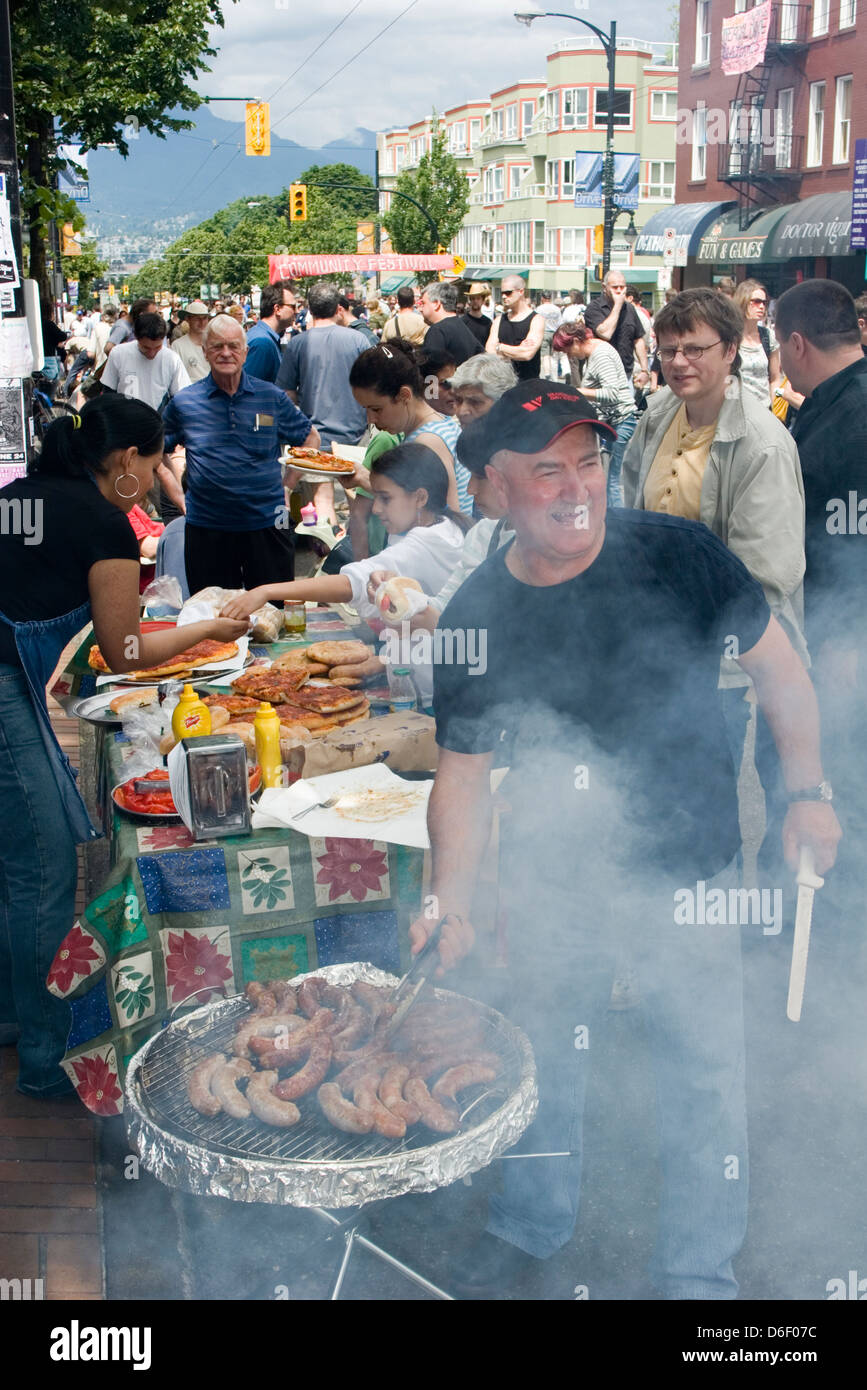 Cooking and sellling food at street stalls on Commercial Drive ...