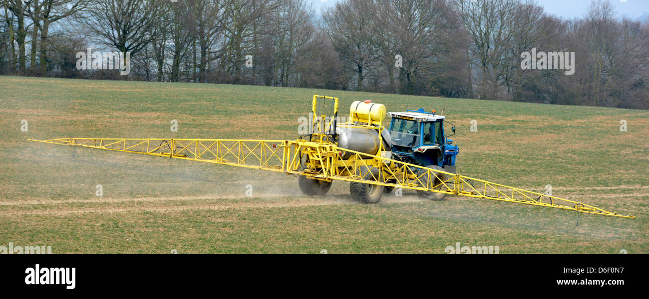 Agriculture farmer spraying fertilizer hi-res stock photography and ...