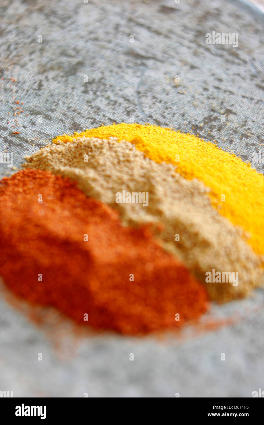 Cumin, turmeric and cayenne Stock Photo - Alamy