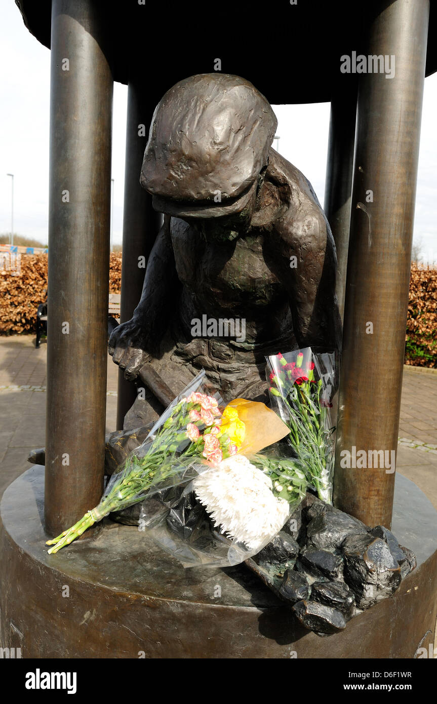 Hucknall,Notts.UK.17th April 2013.Local ex-miners leave floral tributes ...