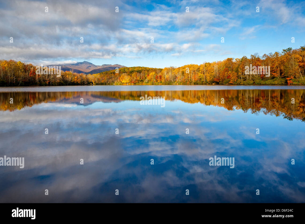 Morning reflection at Julian Price Lake along the Blue Ridge Highway in ...