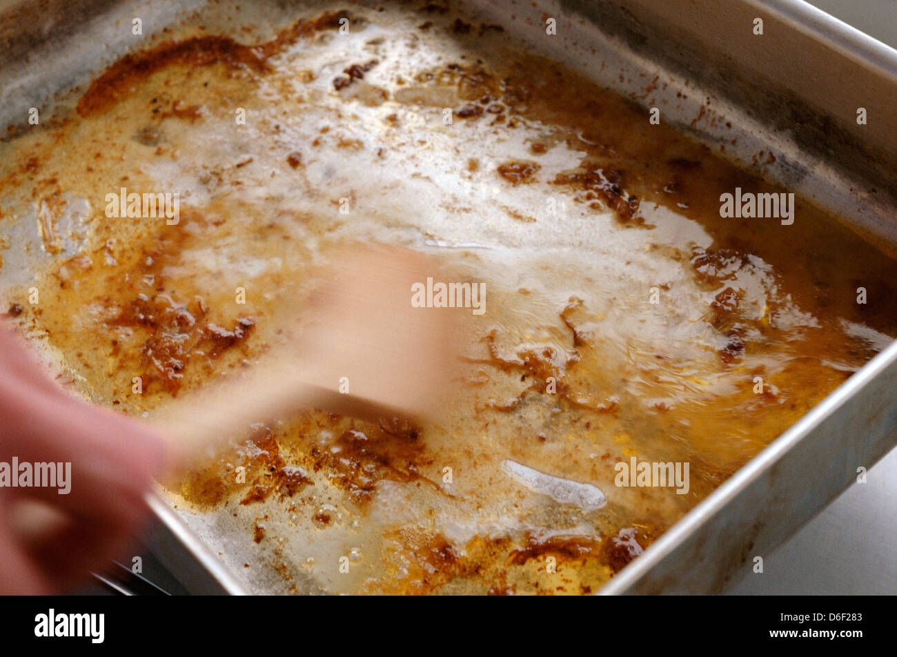 Deglazing a Pan Stock Photo - Alamy