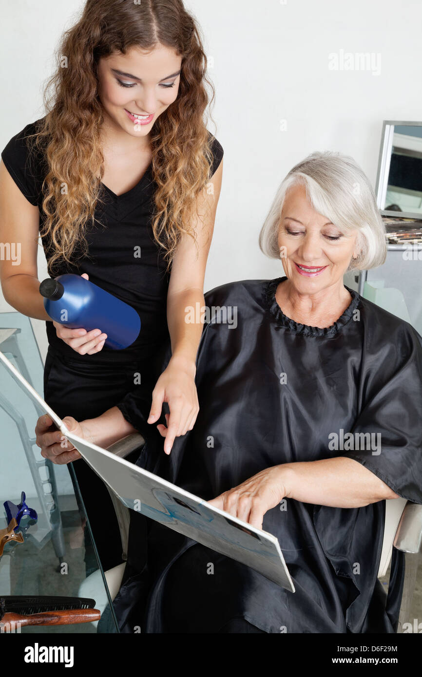 Client And Hairdresser Choosing Hair Color Stock Photo - Alamy
