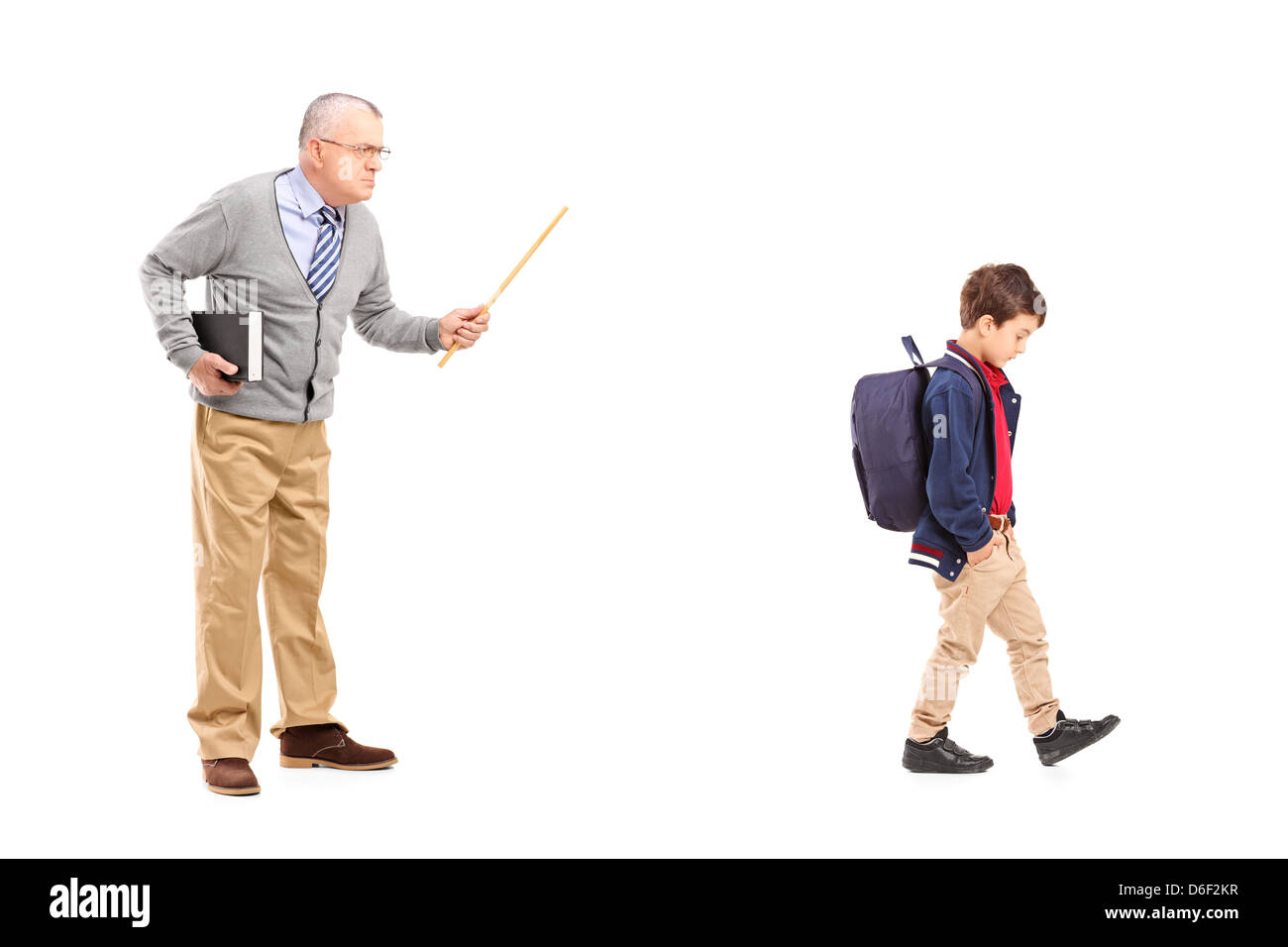 Full length portrait of an angry teacher shouting at a little schoolboy ...