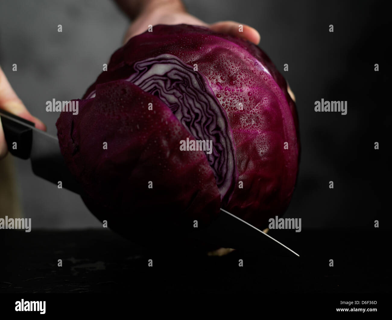 Cutting a Red Cabbage Stock Photo - Alamy