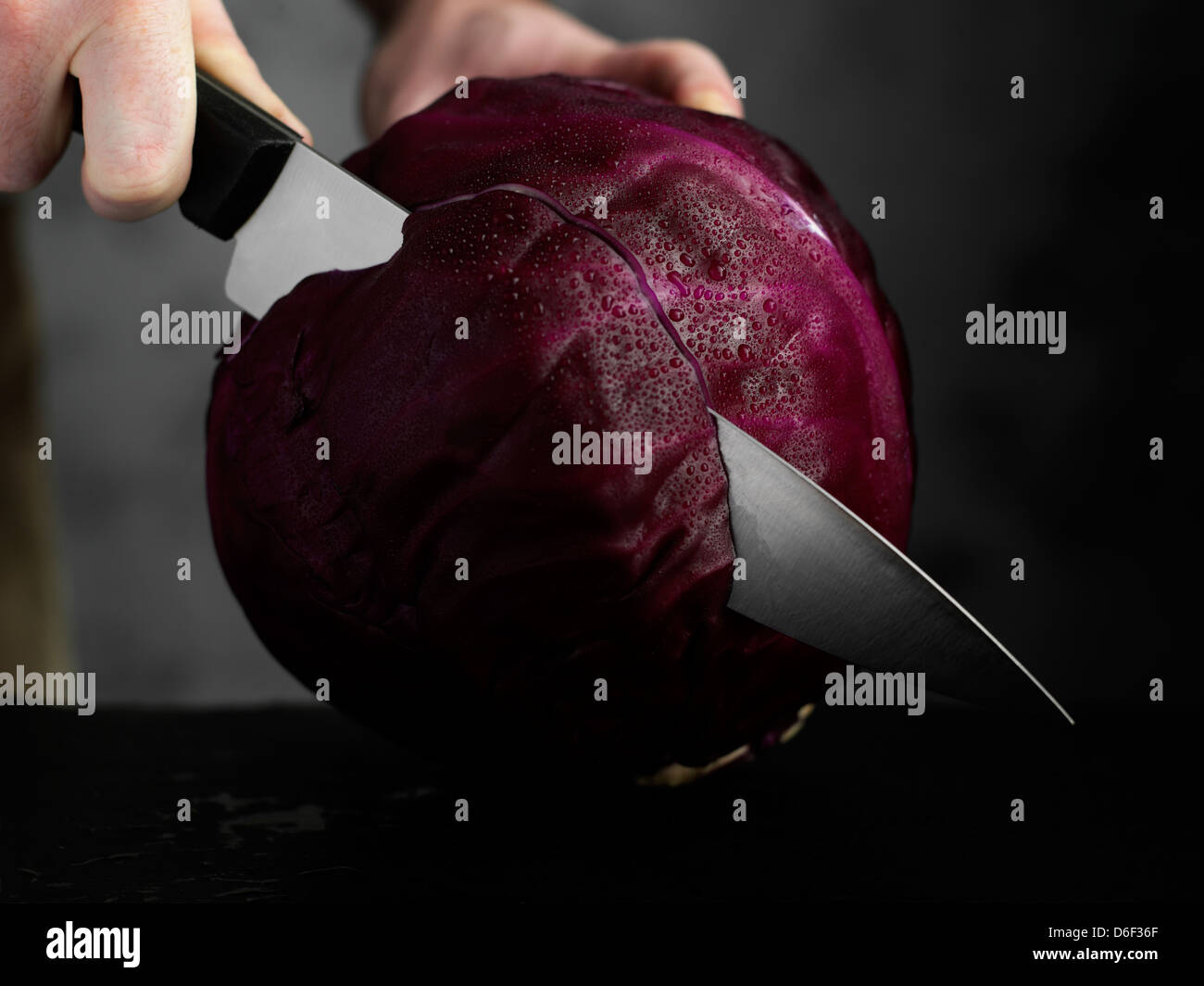 Cutting a Red Cabbage Stock Photo - Alamy