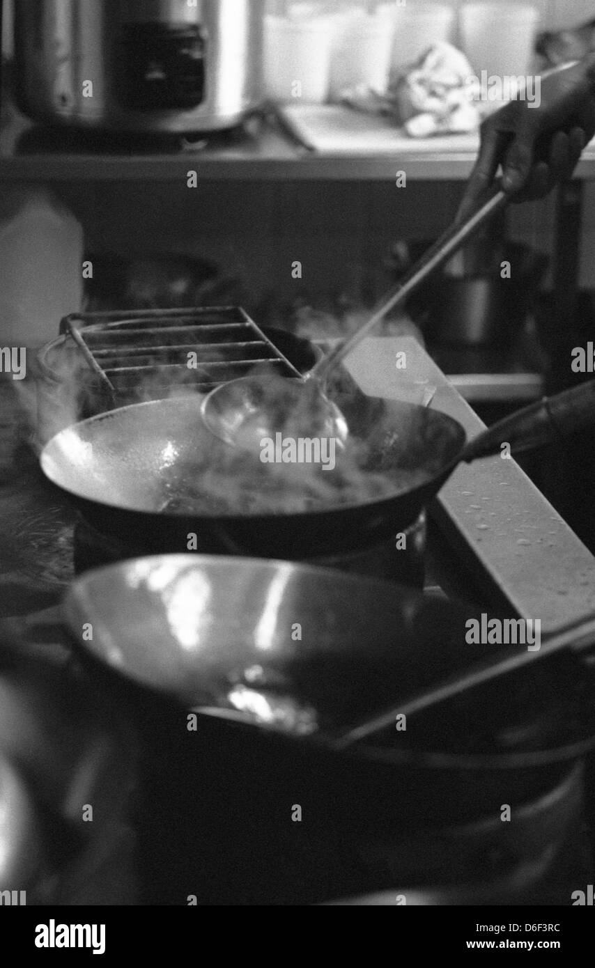 Kitchen cooking photos Black and White Stock Photos & Images - Alamy