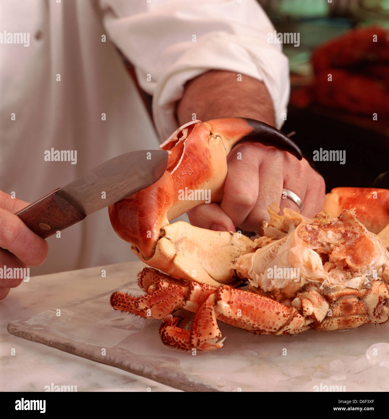Cracking Open Crab Claws Stock Photo - Alamy