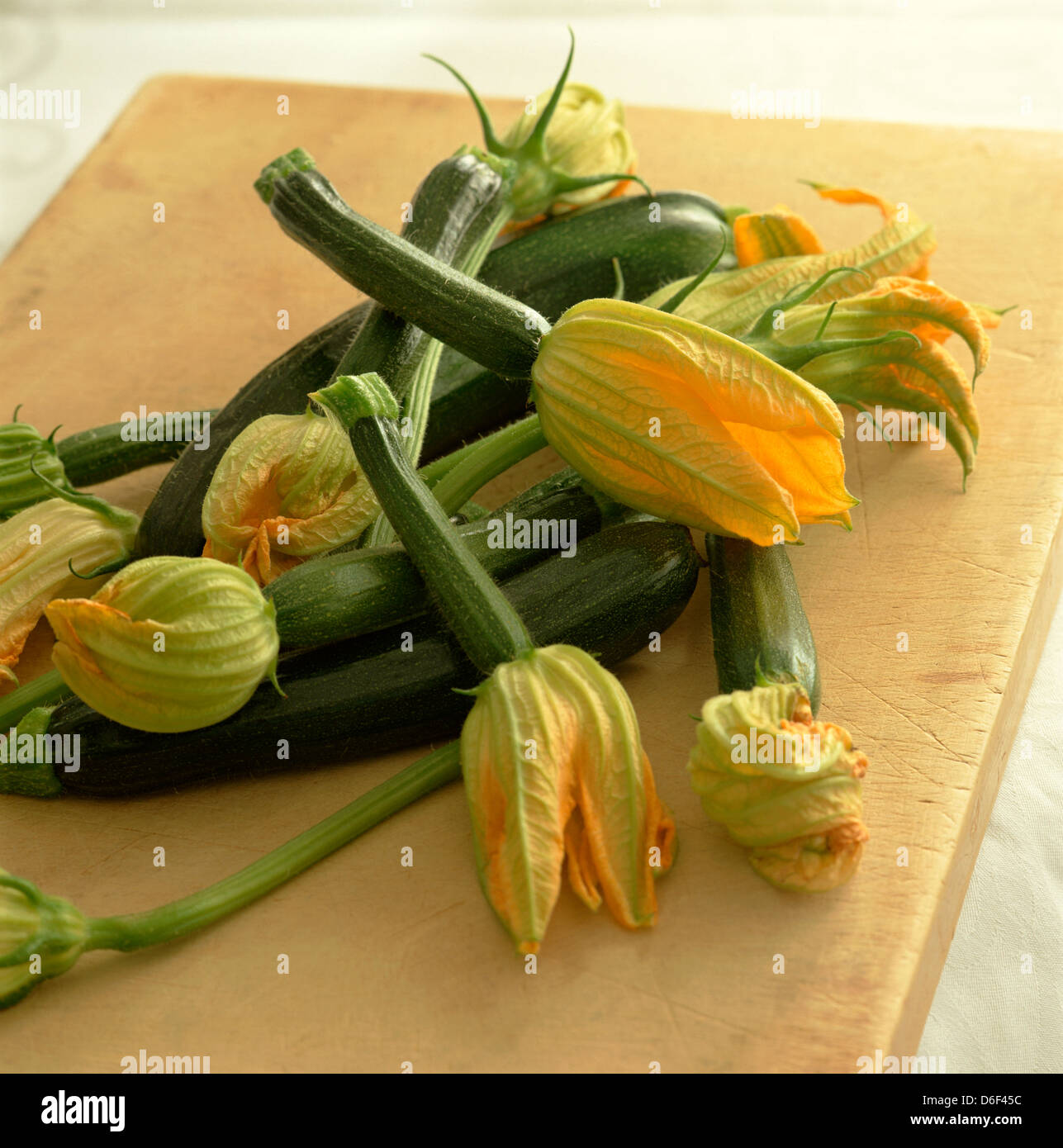 Courgettes with Flowers Stock Photo - Alamy