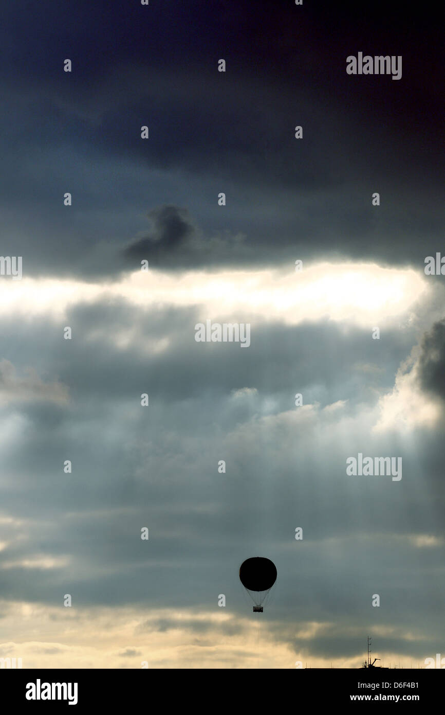Berlin, Germany, sun shining through a thick cloud cover Stock Photo ...