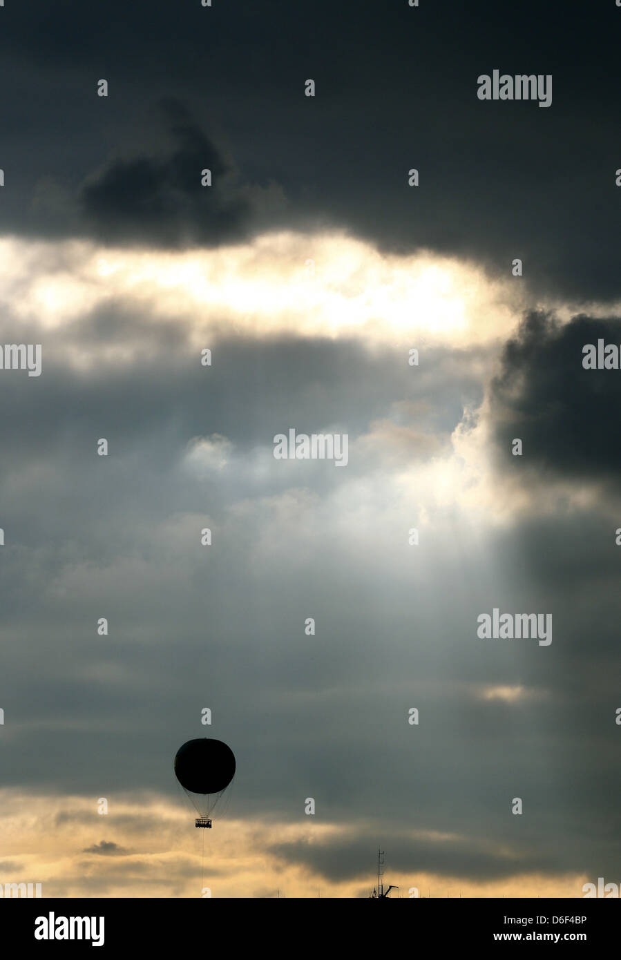 Berlin, Germany, sun shining through a thick cloud cover Stock Photo ...