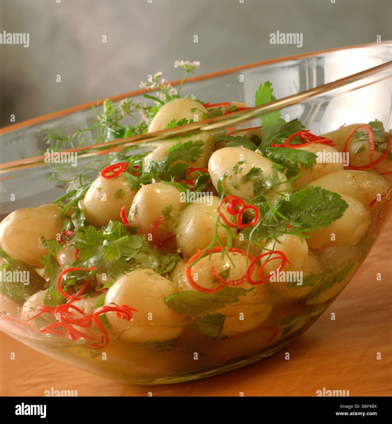 New Potatoes in a Mint and Chilli Dressing Stock Photo - Alamy