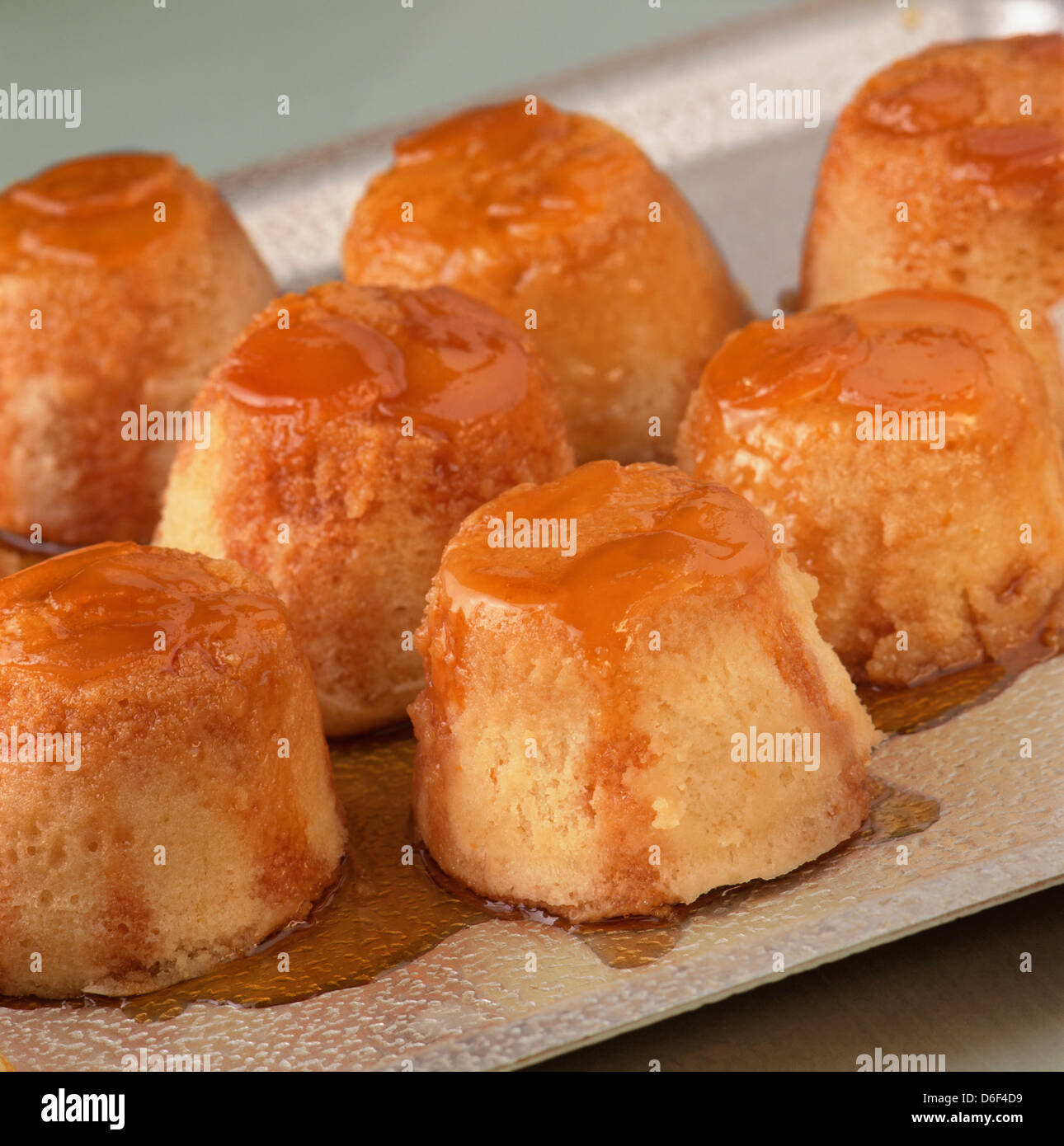 Ginger Steamed Puddings with Syrup Stock Photo - Alamy