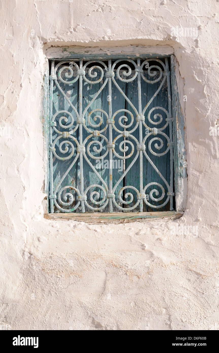 Old blue painted window shutters and wrought iron work Tamezret Tunisia ...