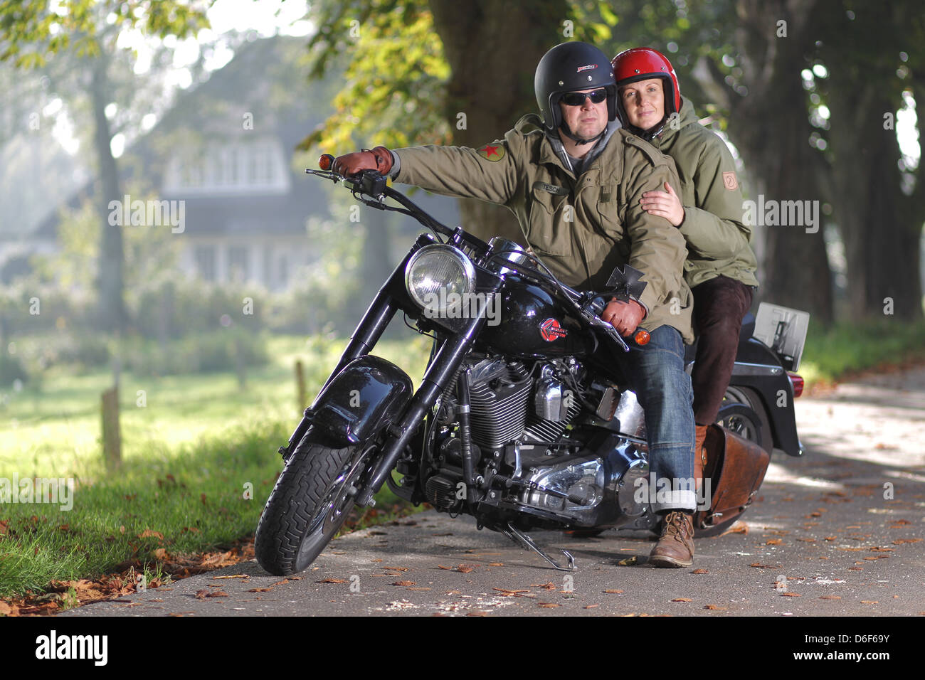 Handewitt, Germany, a couple sitting on his motorcycle, a Harley ...
