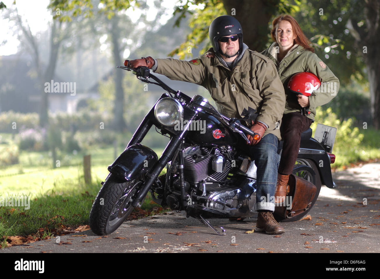 Handewitt, Germany, a couple sitting on his motorcycle, a Harley ...