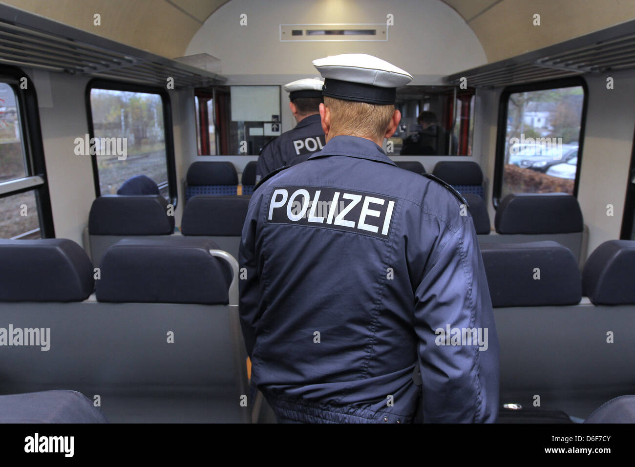 Flensburg, Germany, the federal police at a control in the train of ...