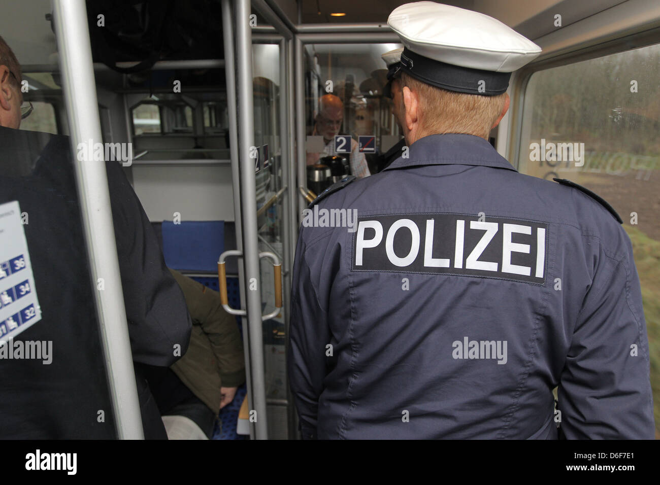 Flensburg, Germany, the federal police at a control in the train of ...