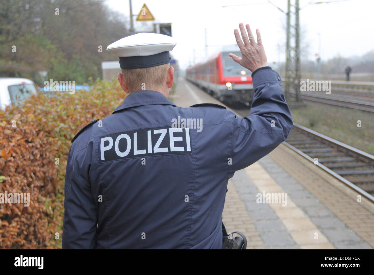 Flensburg, Germany, police officer greets the engine driver Stock Photo ...