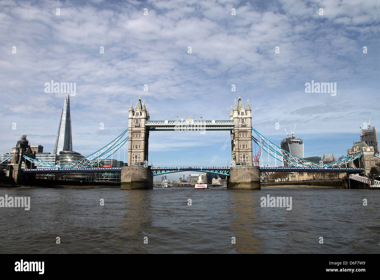 Tower Bridge showing the full span and also showing the Shard building ...