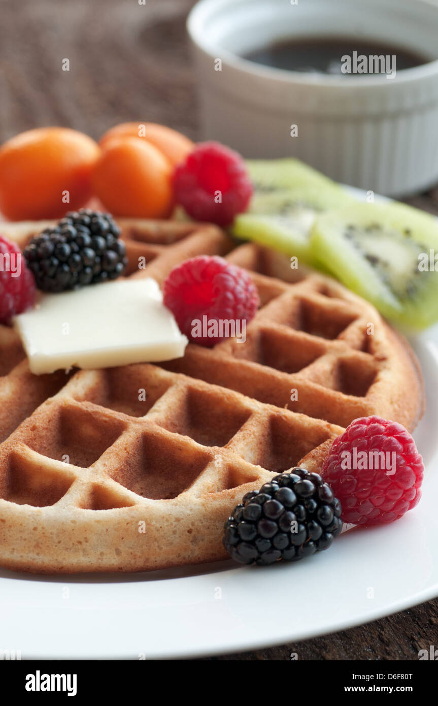 Golden waffle from scratch with fresh fruit Stock Photo - Alamy