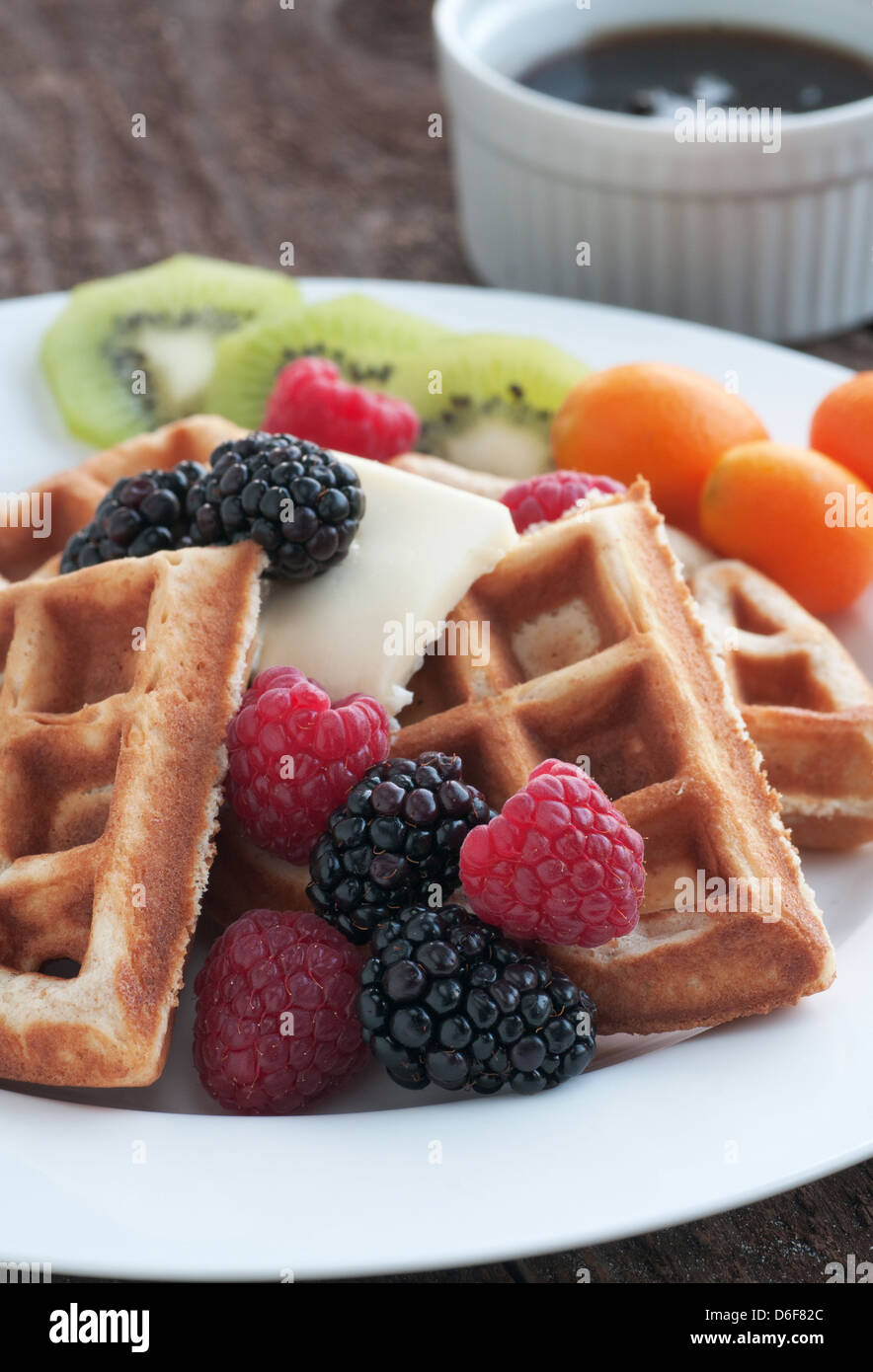 Golden waffle from scratch with fresh fruit Stock Photo - Alamy