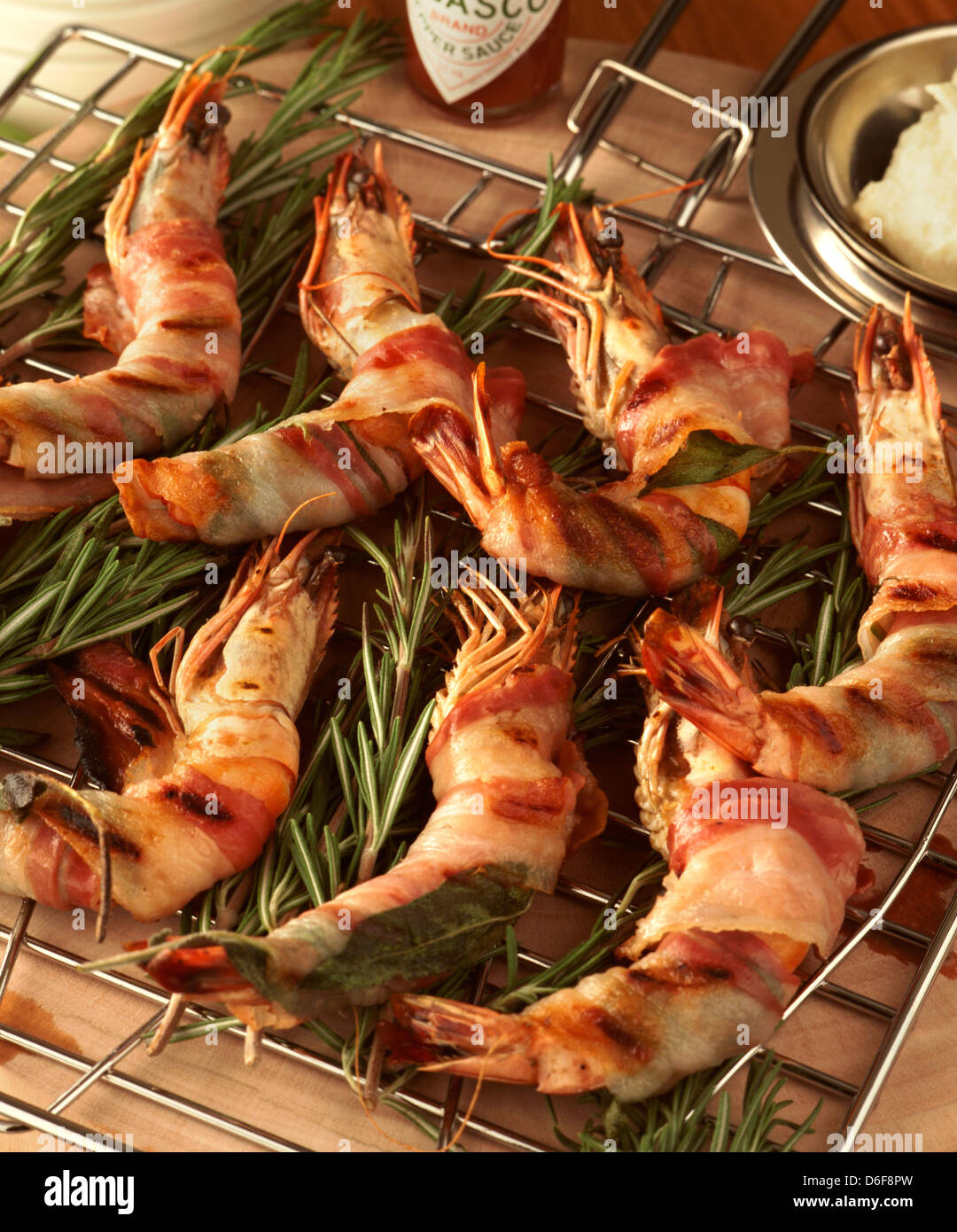 Prawns Wrapped in Bacon Stock Photo - Alamy