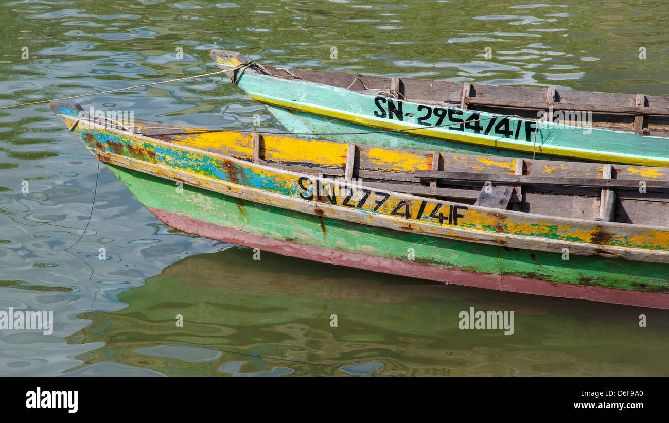 Two sharp prowed boats in Sandakan harbour in Sabah Malaysian Borneo ...