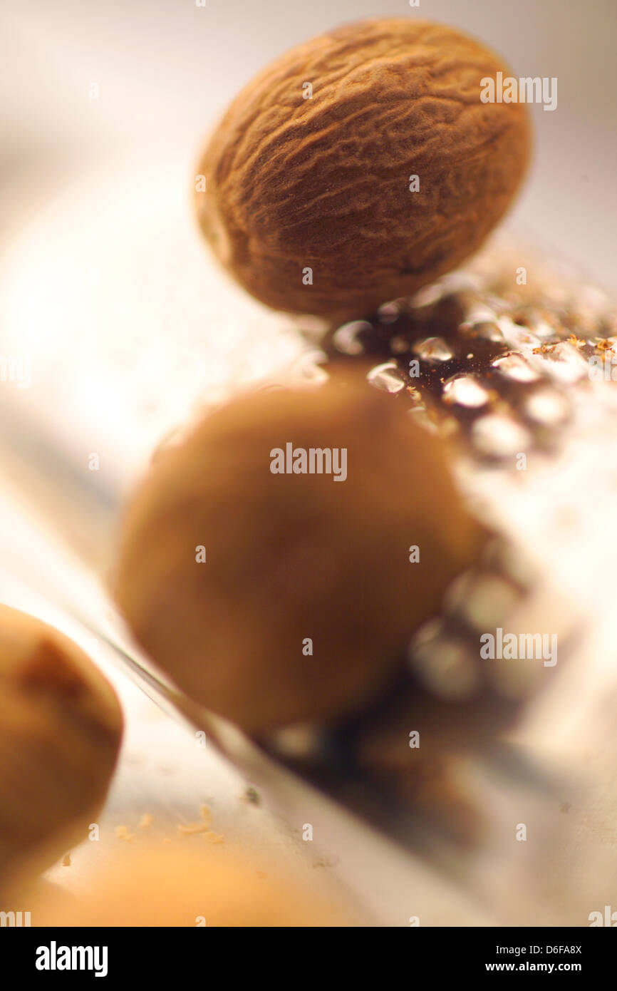 Nutmeg on Grater Stock Photo - Alamy