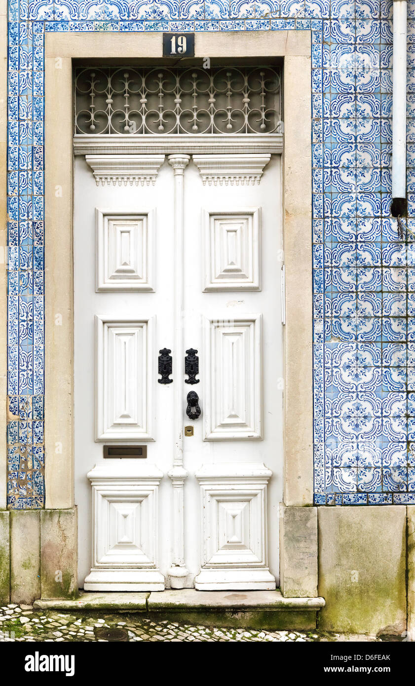 Lisbon, Portugal, front door and tiled facade of a house Stock Photo ...