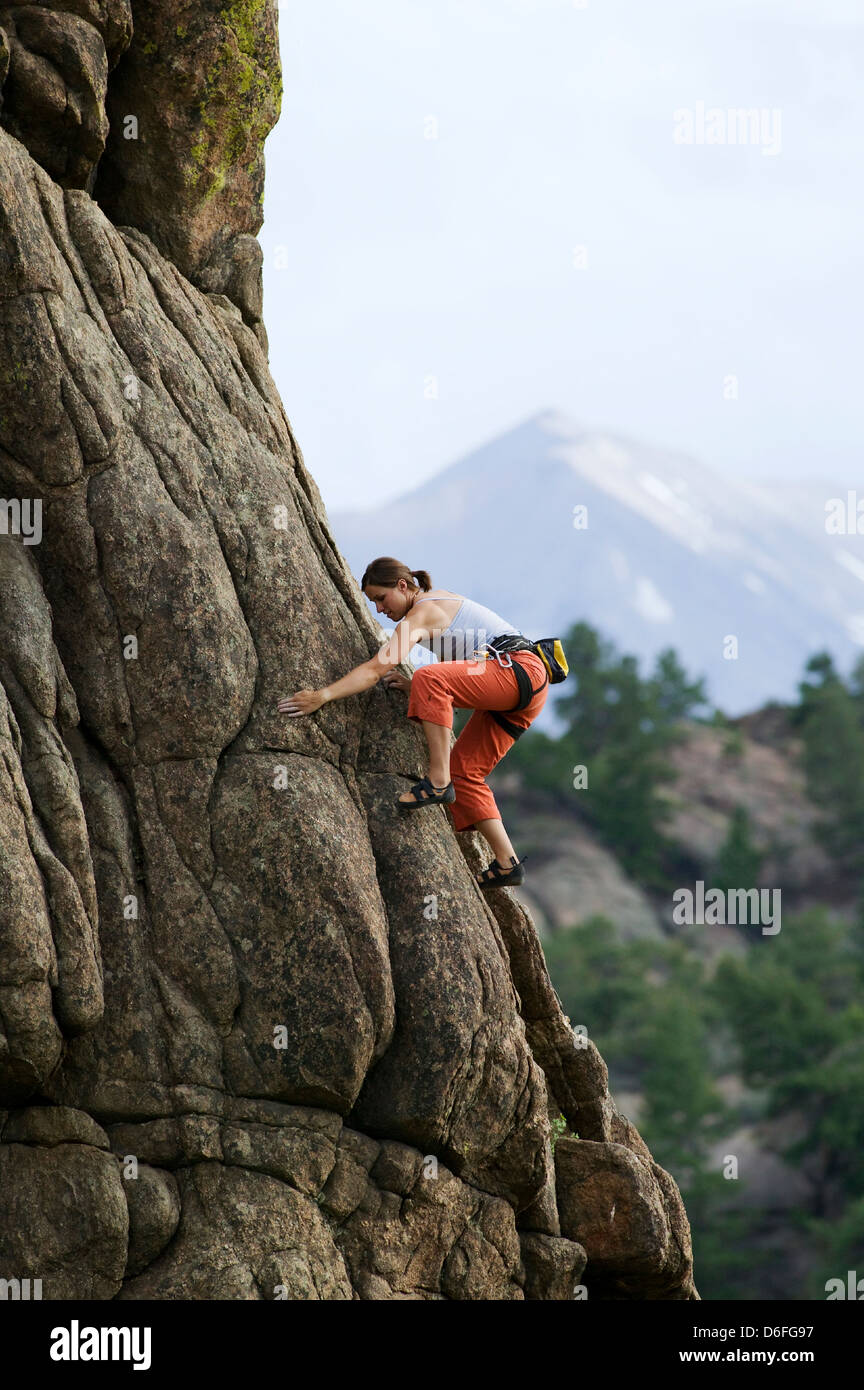 Young woman rock climbing at Elephant Rock, near Buena Vista, Colorado ...