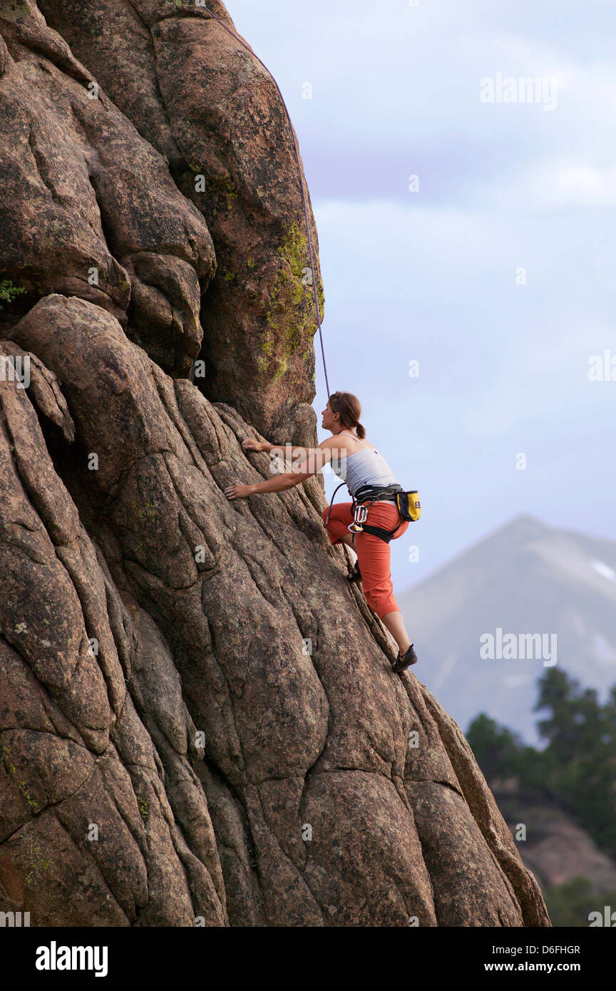 Young woman rock climbing at Elephant Rock, near Buena Vista, Colorado ...