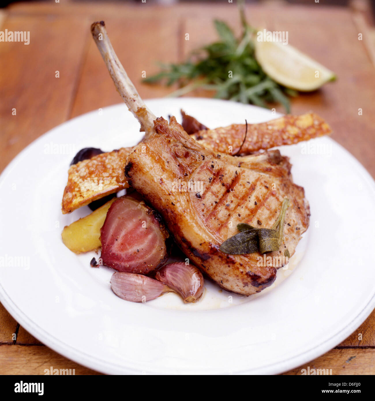Pork Chops with Turnips and Carrots Stock Photo - Alamy