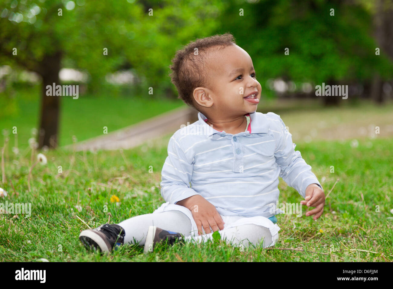 Portrait Of A Little African American Baby Boy Playing Outdoor