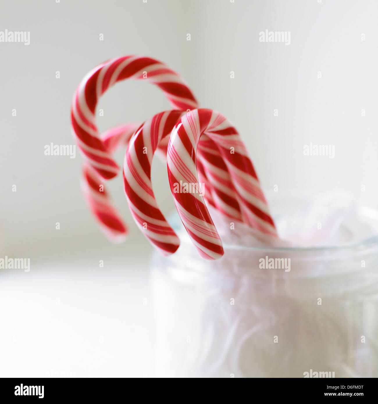 Christmas Candy Sticks in Glass Jar Stock Photo - Alamy