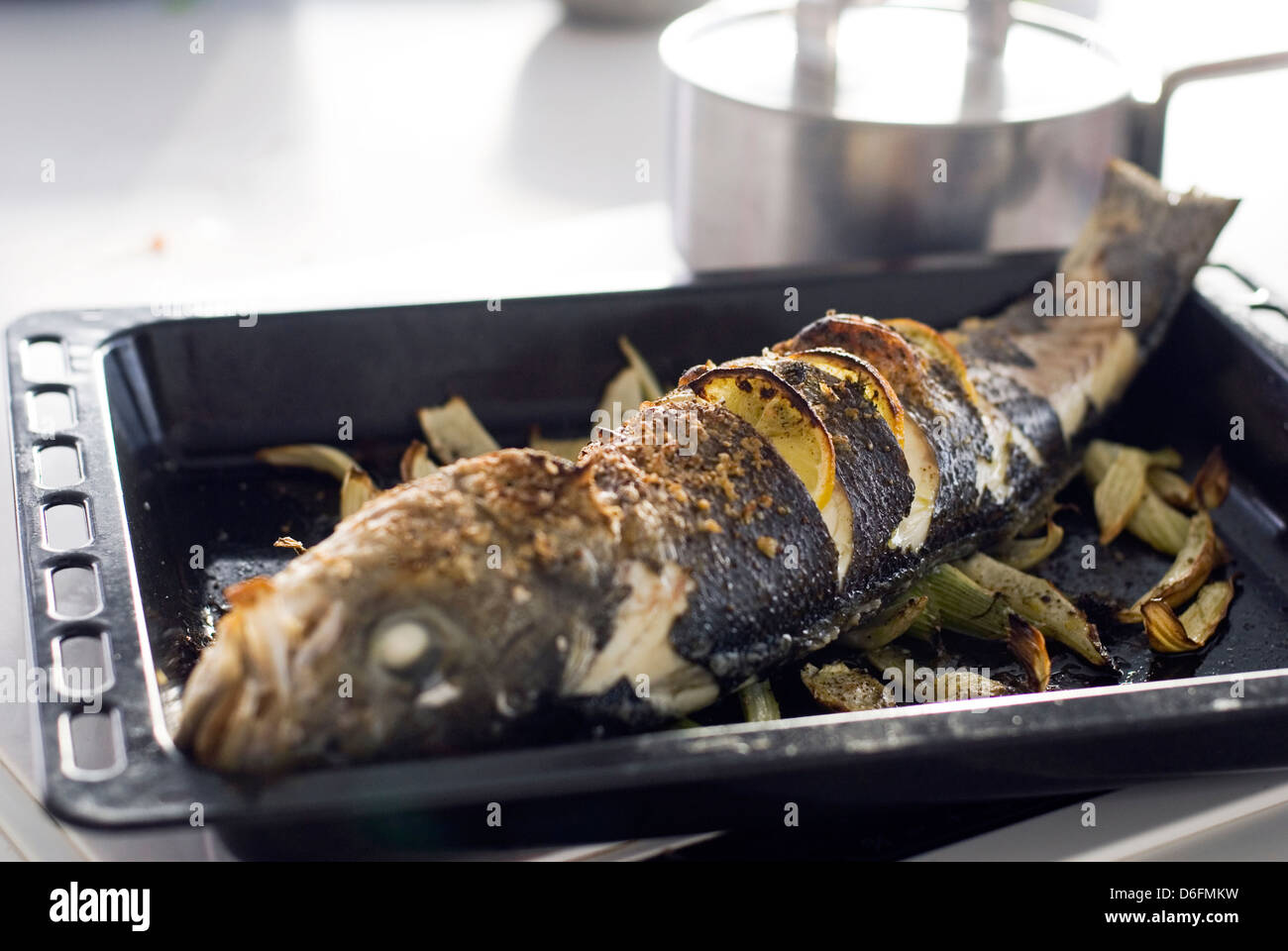Whole roasted fish hi-res stock photography and images - Alamy